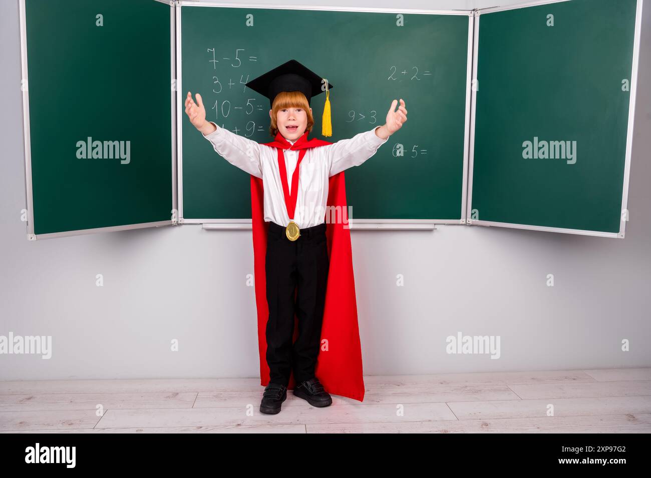 Full body photo of cute little schoolboy diligent graduation hat win ...