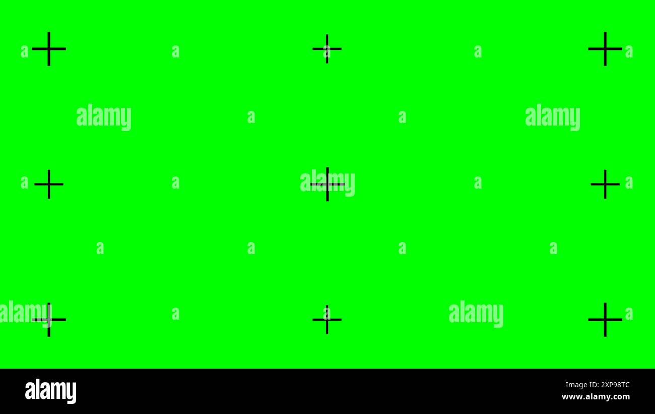 Greenscreen background with black tracking cross-shaped marks. Chroma ...