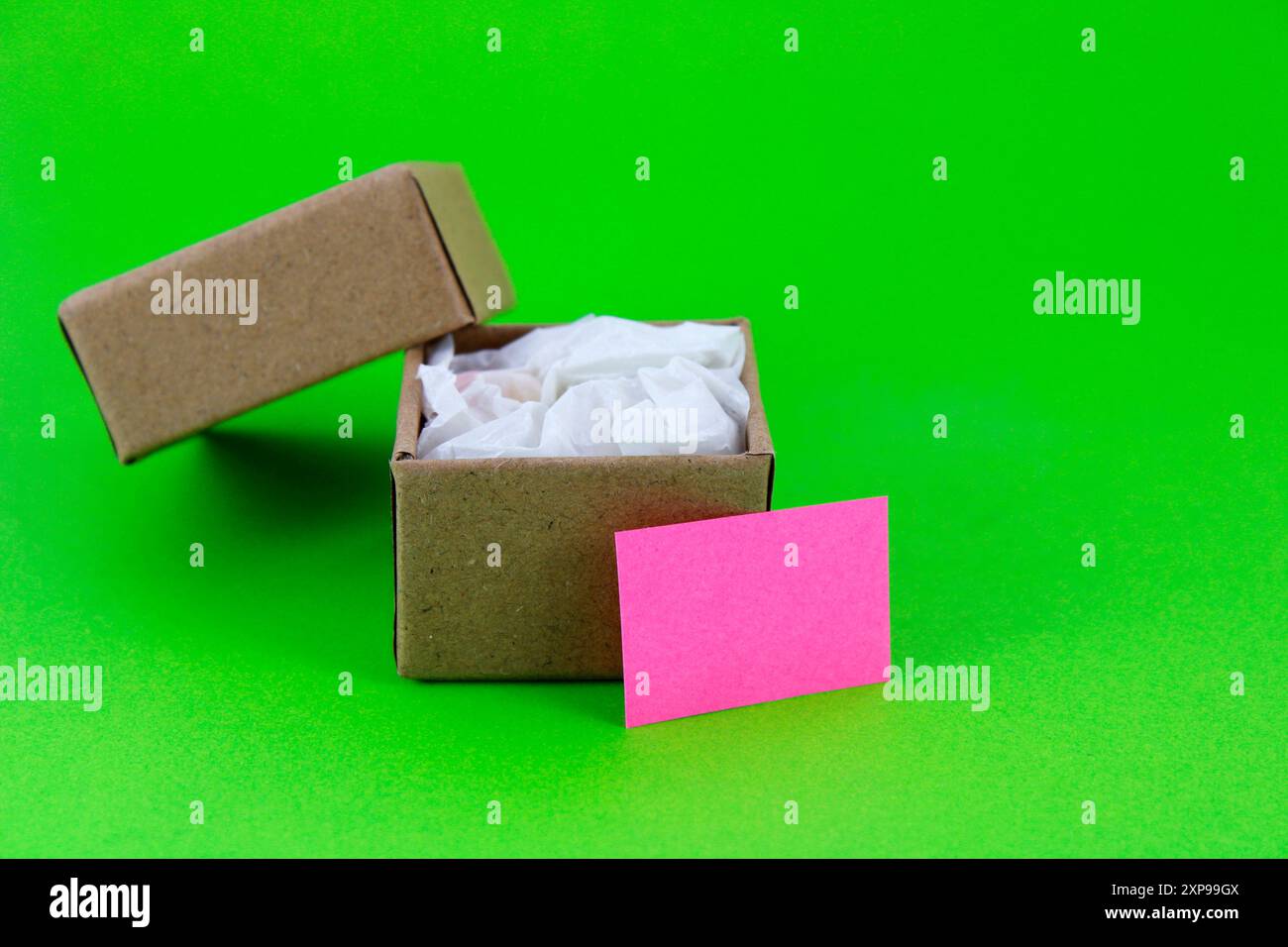 Handmade gift box with pink card Stock Photo - Alamy