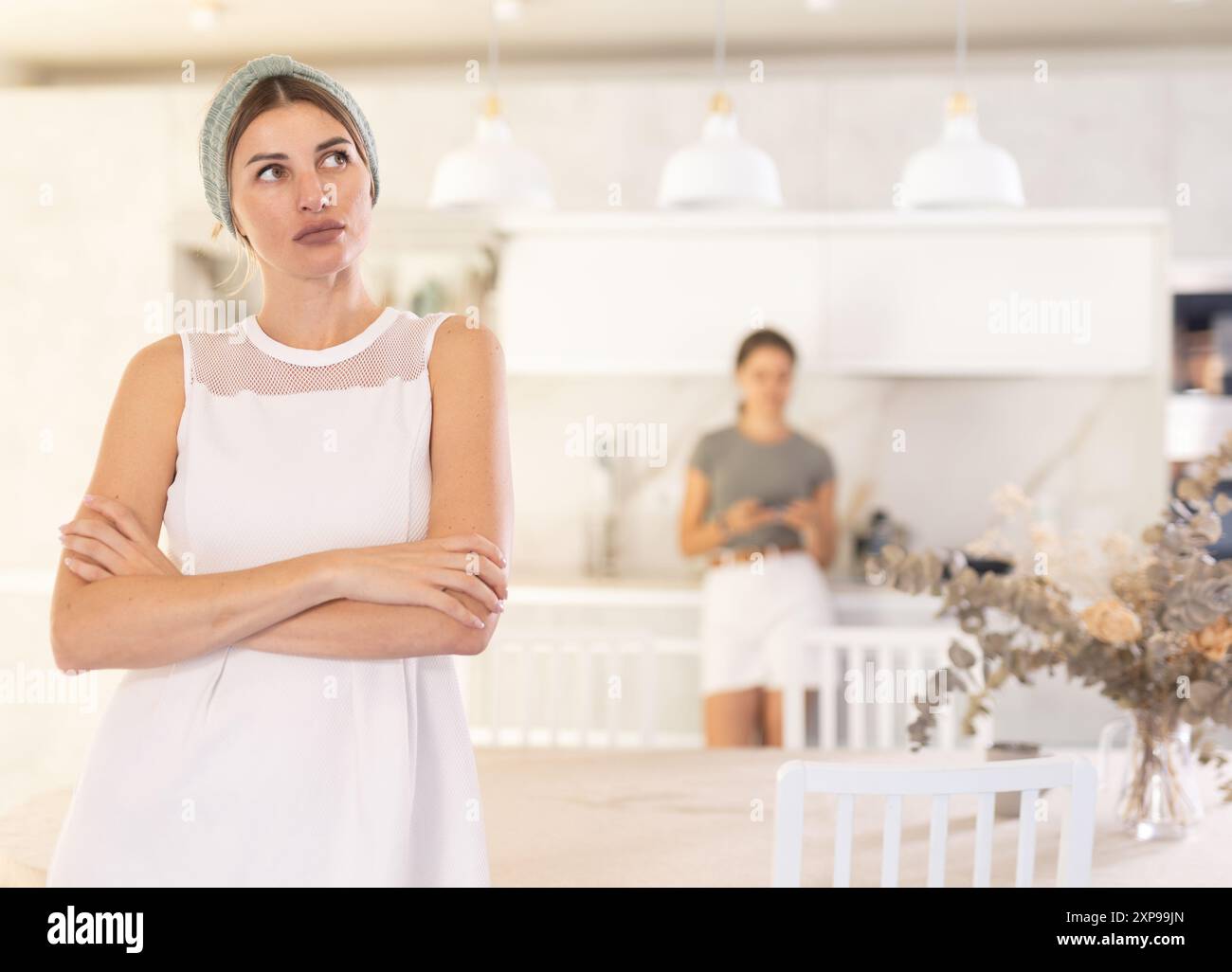 Domestic quarrel - two sisters have quarreled, and they are talking to ...