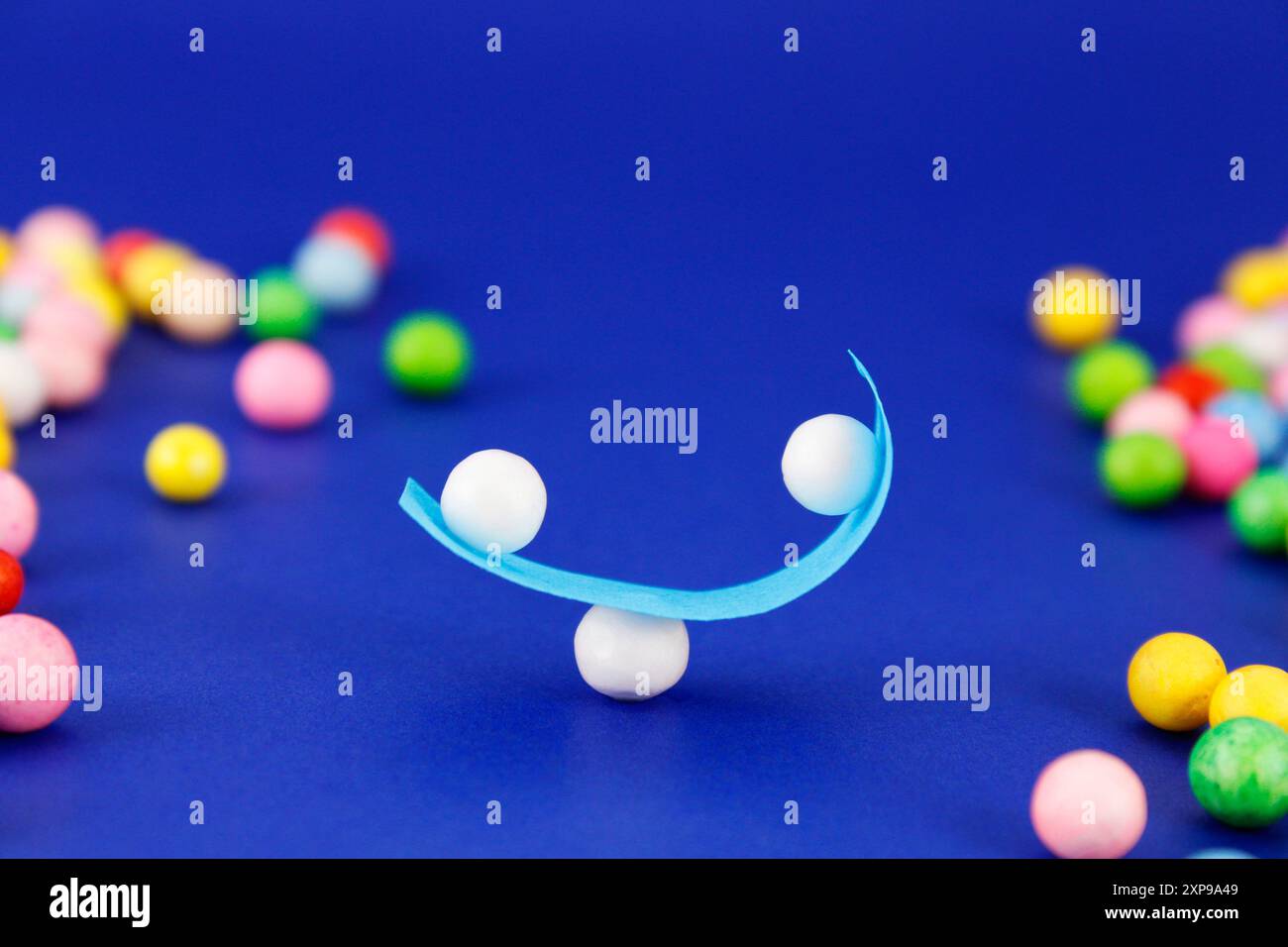 Team, spheres showing skills to keep their balance Stock Photo - Alamy