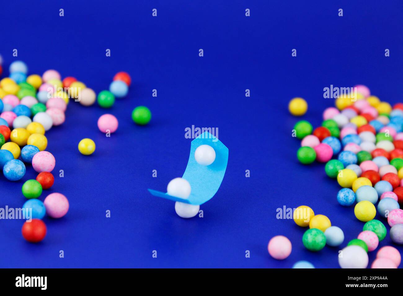 Team, spheres showing skills to keep their balance in front of the rest ...