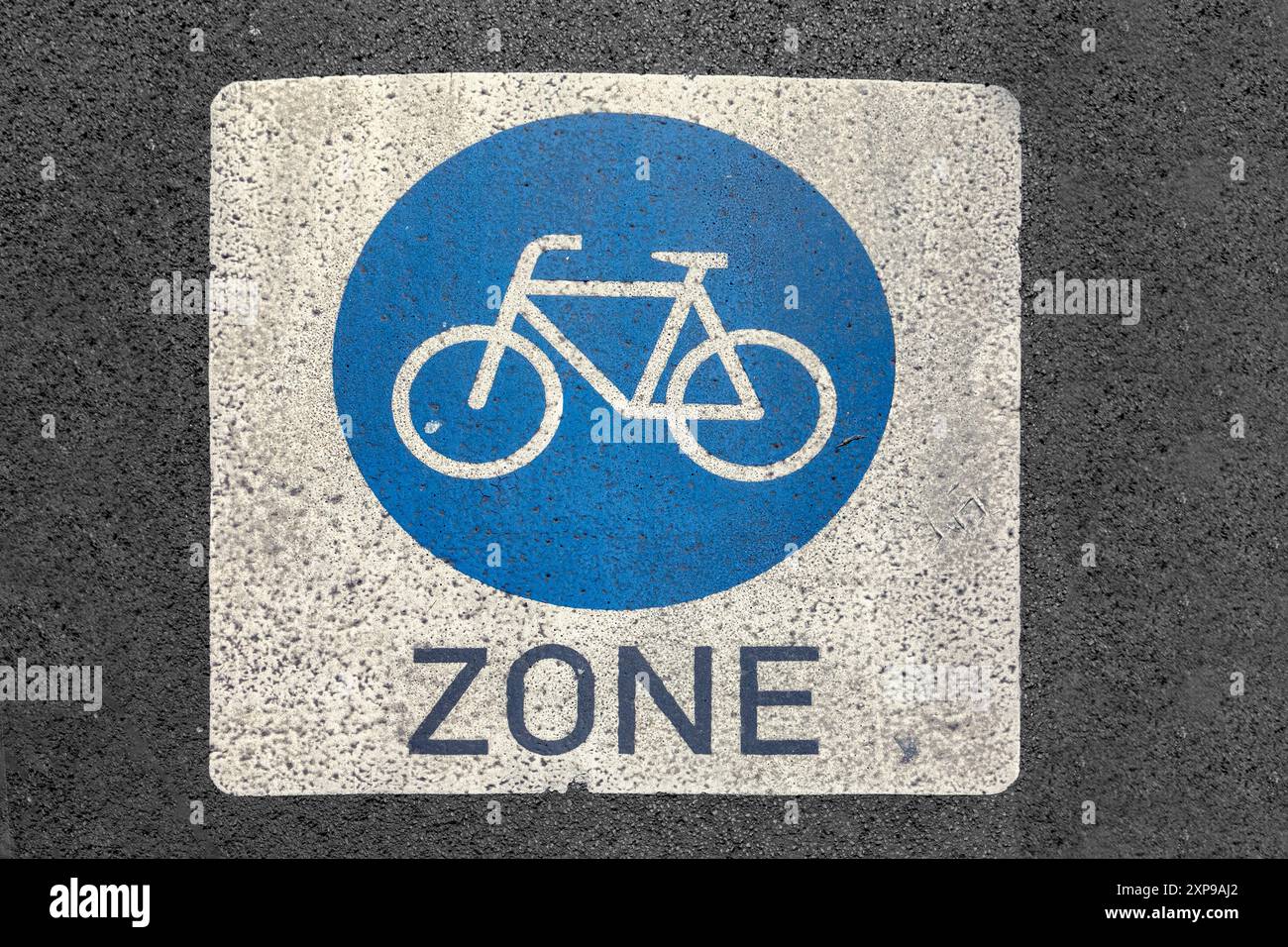 signage bicycle lane at the asphalt in Germany Stock Photo - Alamy