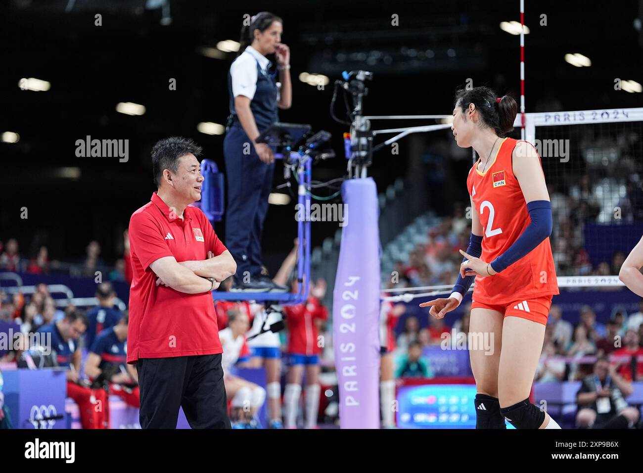 Paris, France. 4th Aug, 2024. Zhu Ting (R) of China talks with head coach Cai Bin during the ...