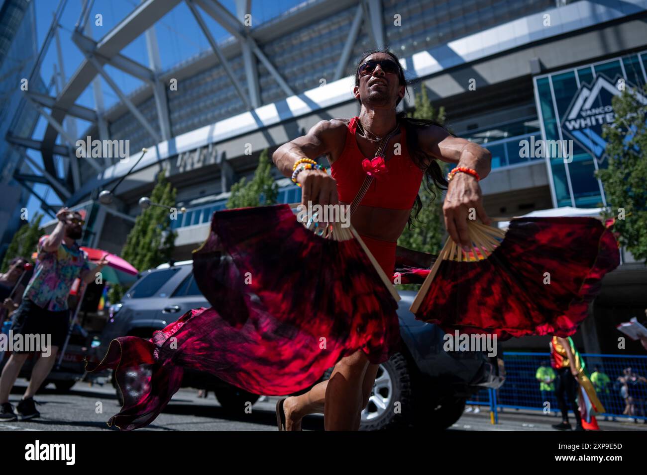 Vancouver, Canada. 04th Aug, 2024. A dancer waves their fans during the ...