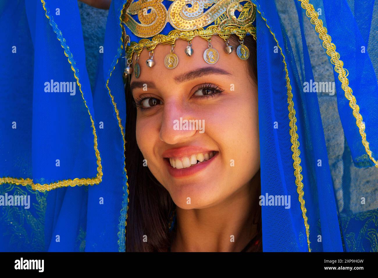 A beautiful young girl in traditional Azerbaijani attire at Icheri ...
