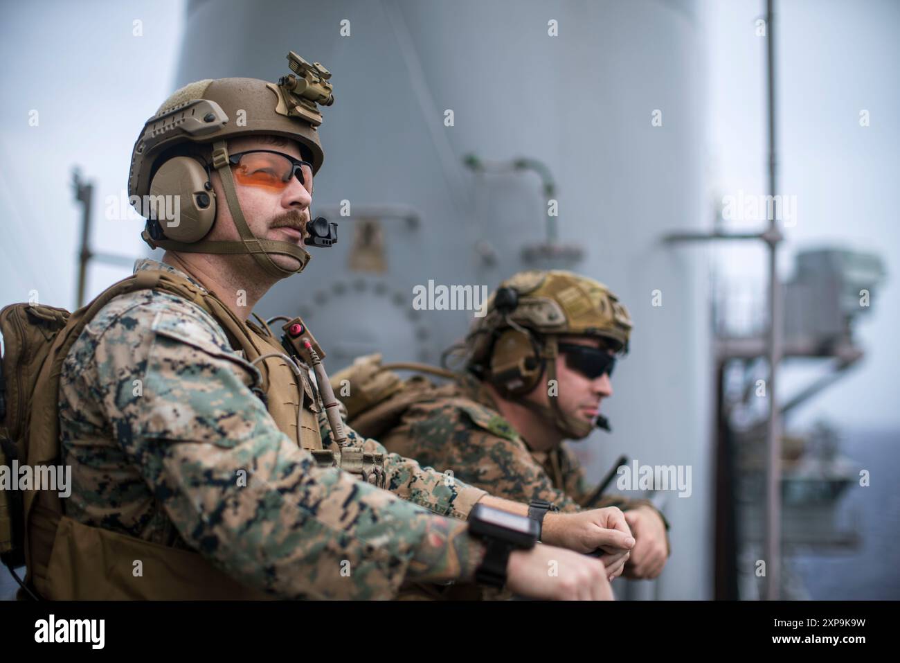 U.S. Marine Corps Gunnery Sgt. Gavin Glon, left, a joint terminal ...