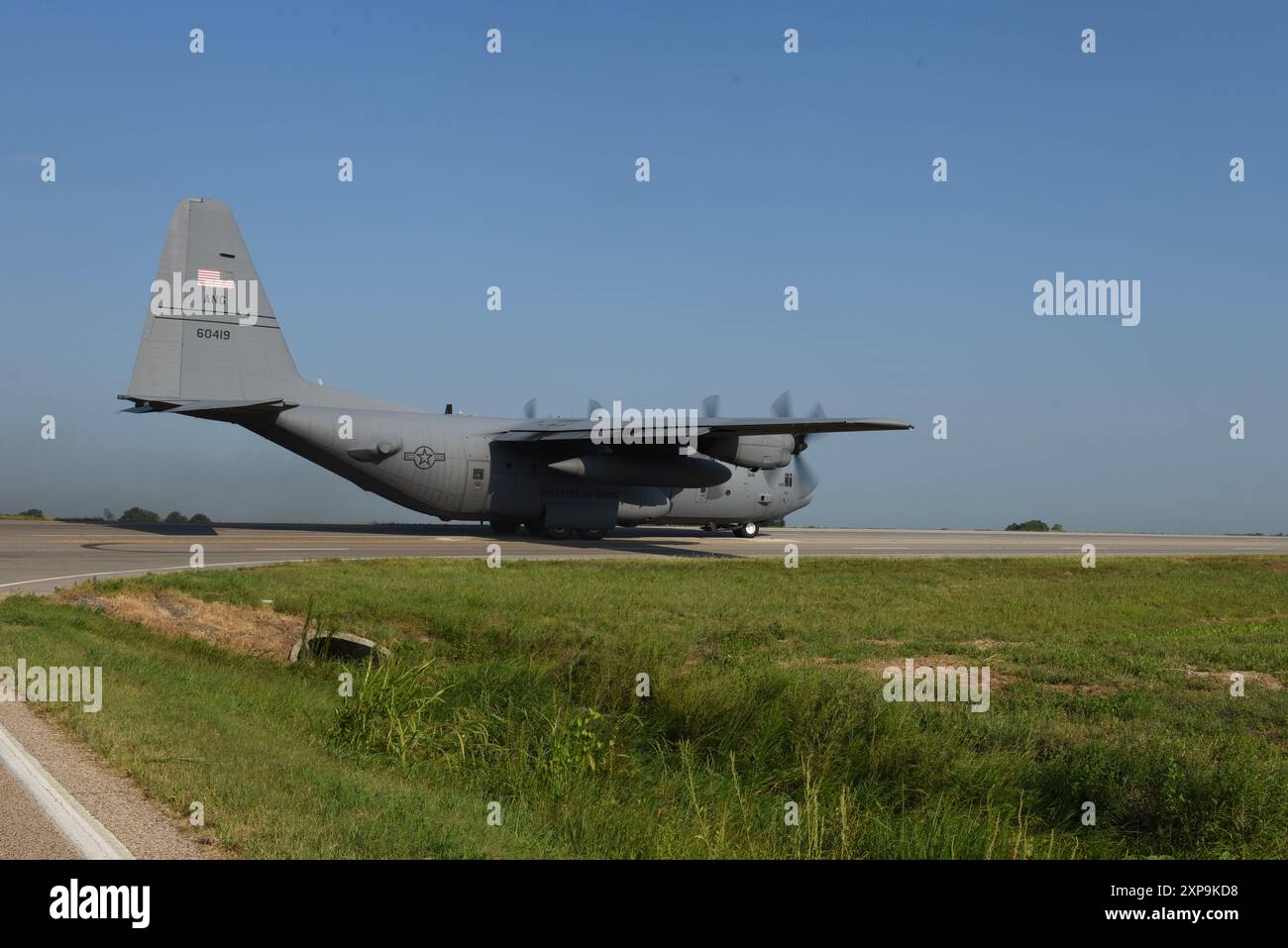 A 189th Airlift Wing C-130H cargo plane taxis on Arkansas Highway 63 as ...