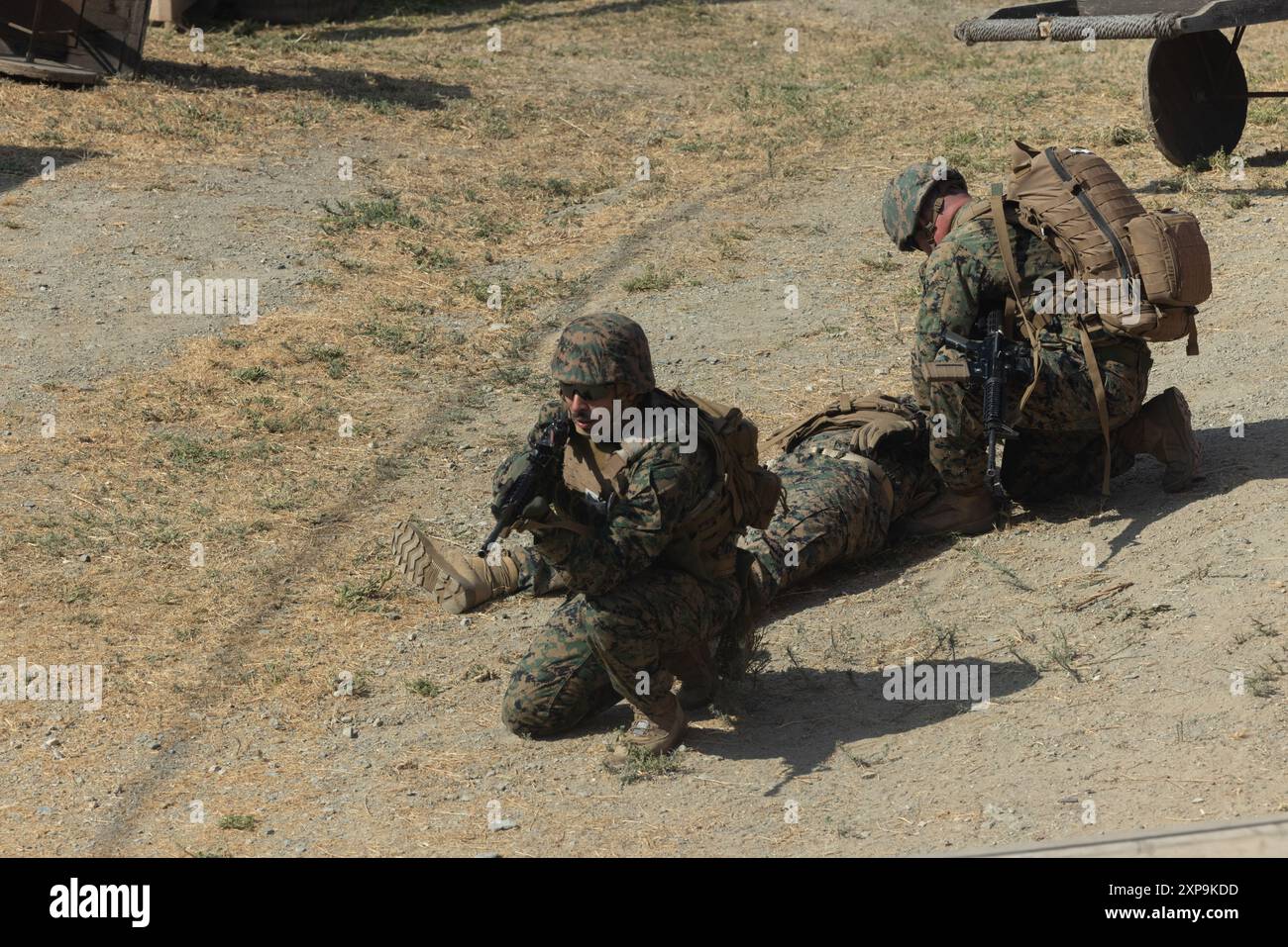 U.S. Marine Corps Sgt. Joe Malavez, left, a native of Worcester ...