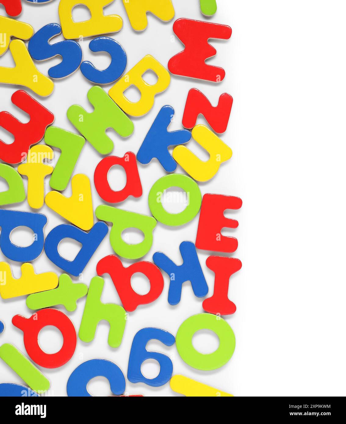 Alphabet. Many colorful magnetic letters isolated on white, top view ...