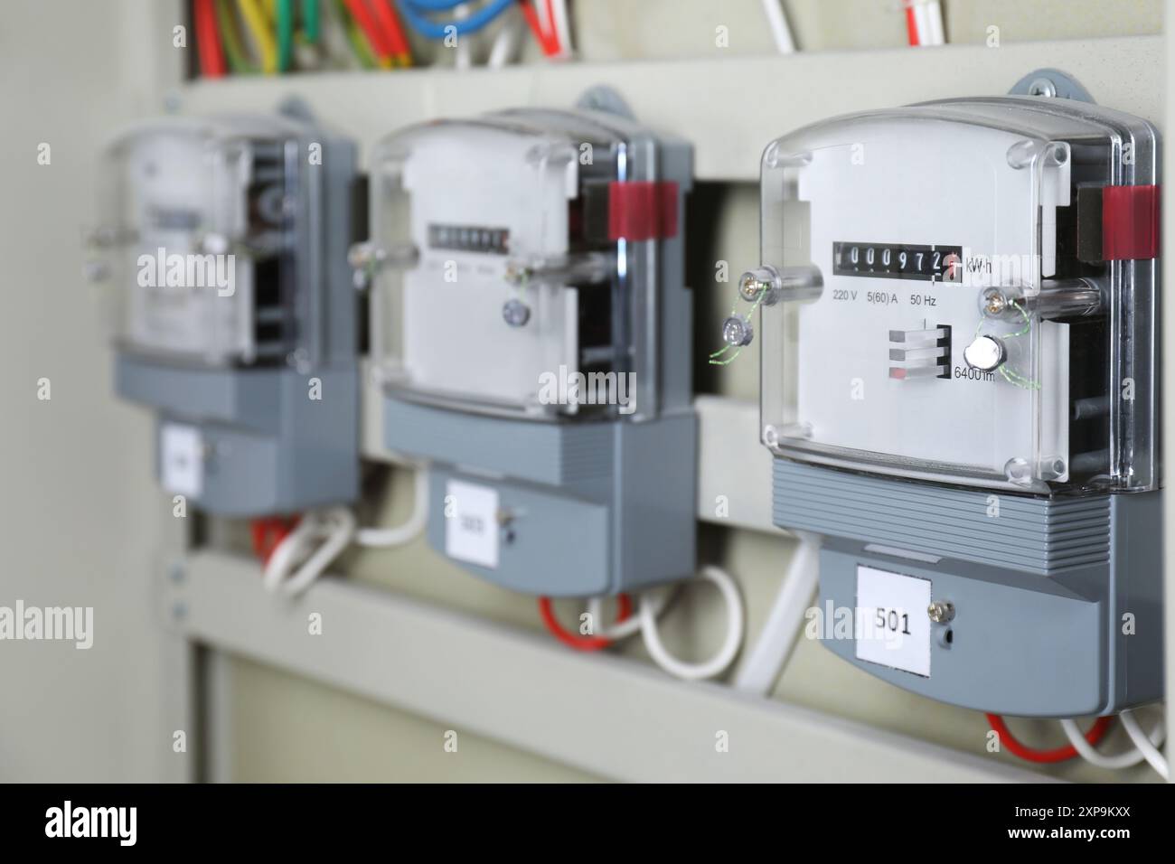Electric meters and wires in fuse box. Energy measuring device Stock ...