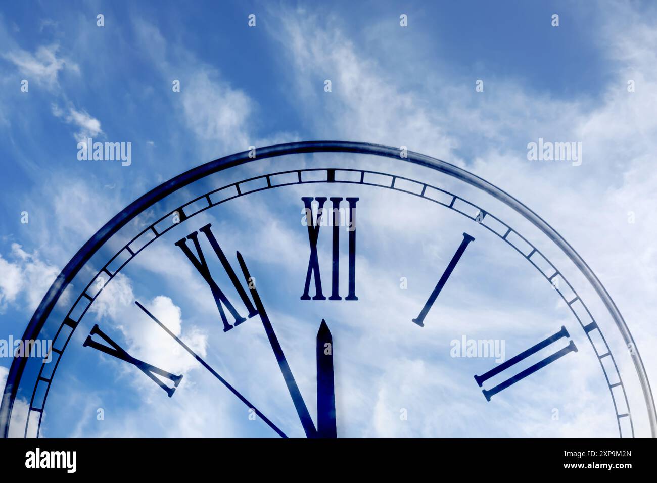 Time concept. Clock and blue sky with fluffy clouds, double exposure ...