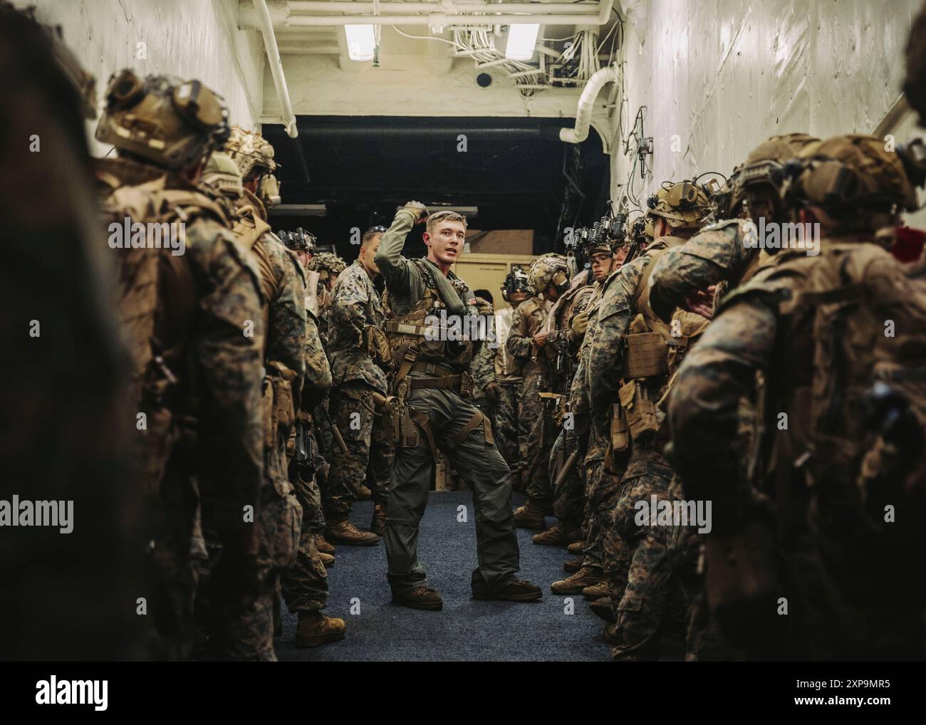 A U.S. Marine Corps crew chief assigned to Marine Medium Tiltrotor ...
