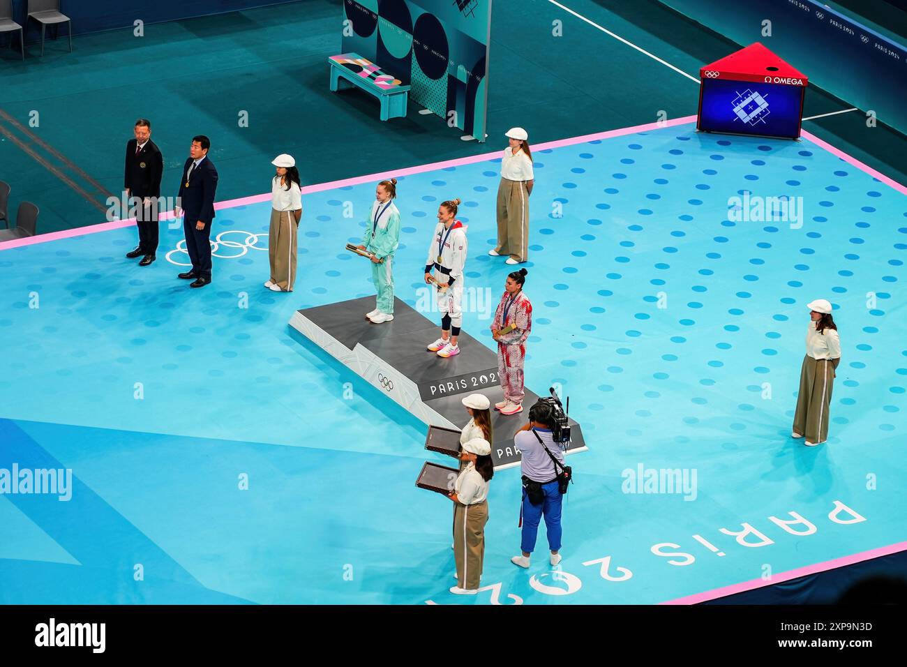 Paris, France - Aug 2, 2024 : Trampoline medalists on the podium of the ... Paris, France - Aug 2, 2024 : Trampoline medalists on the podium of the ...