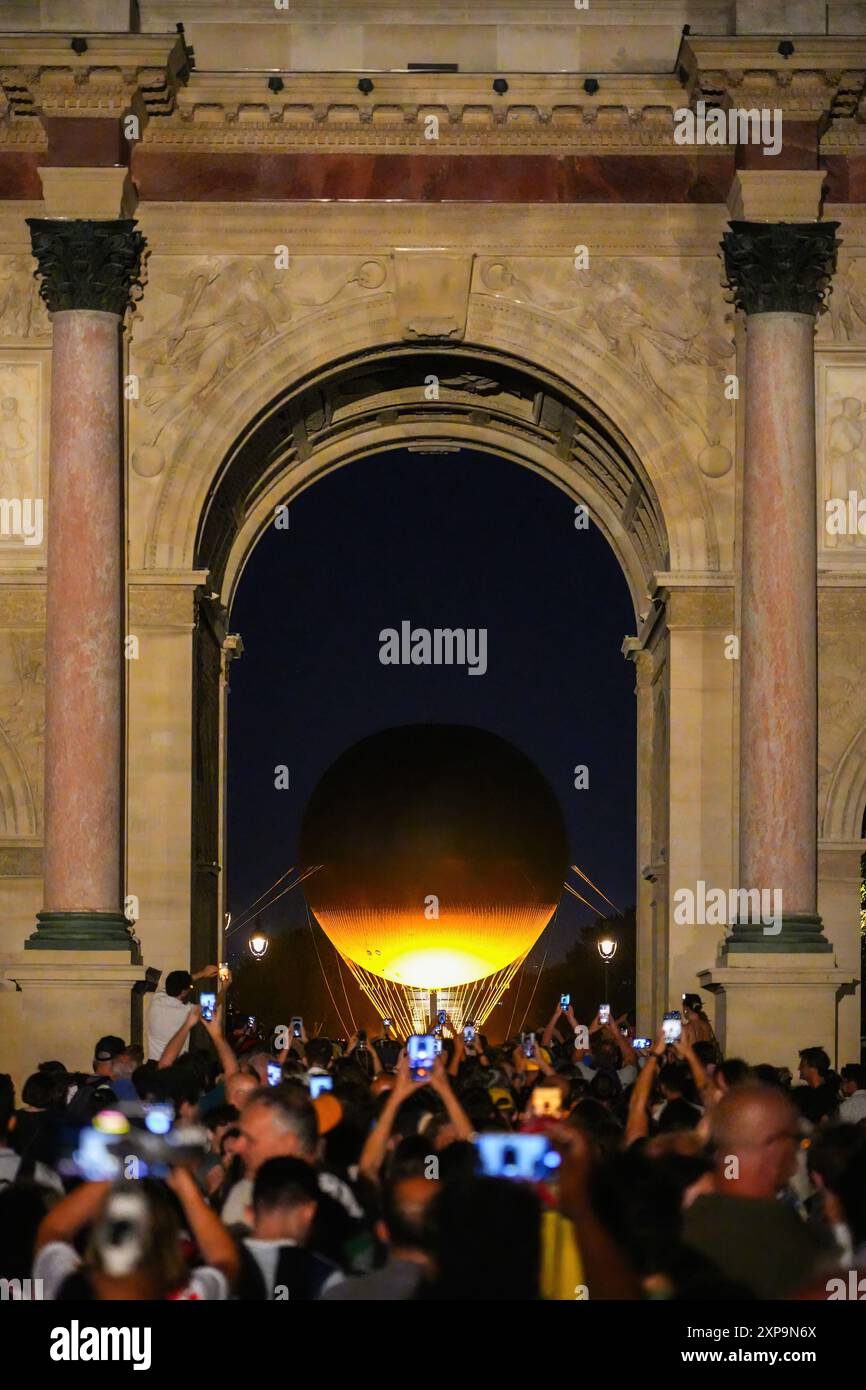 Paris, France - Aug 2, 2024 : Olympic Flame tethered balloon under the ...