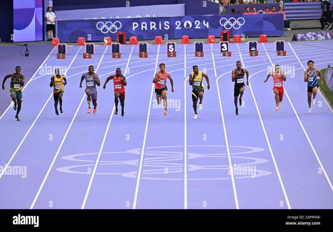 Athletes compete in the men's 100-meter semifinal at the Paris Olympics ...