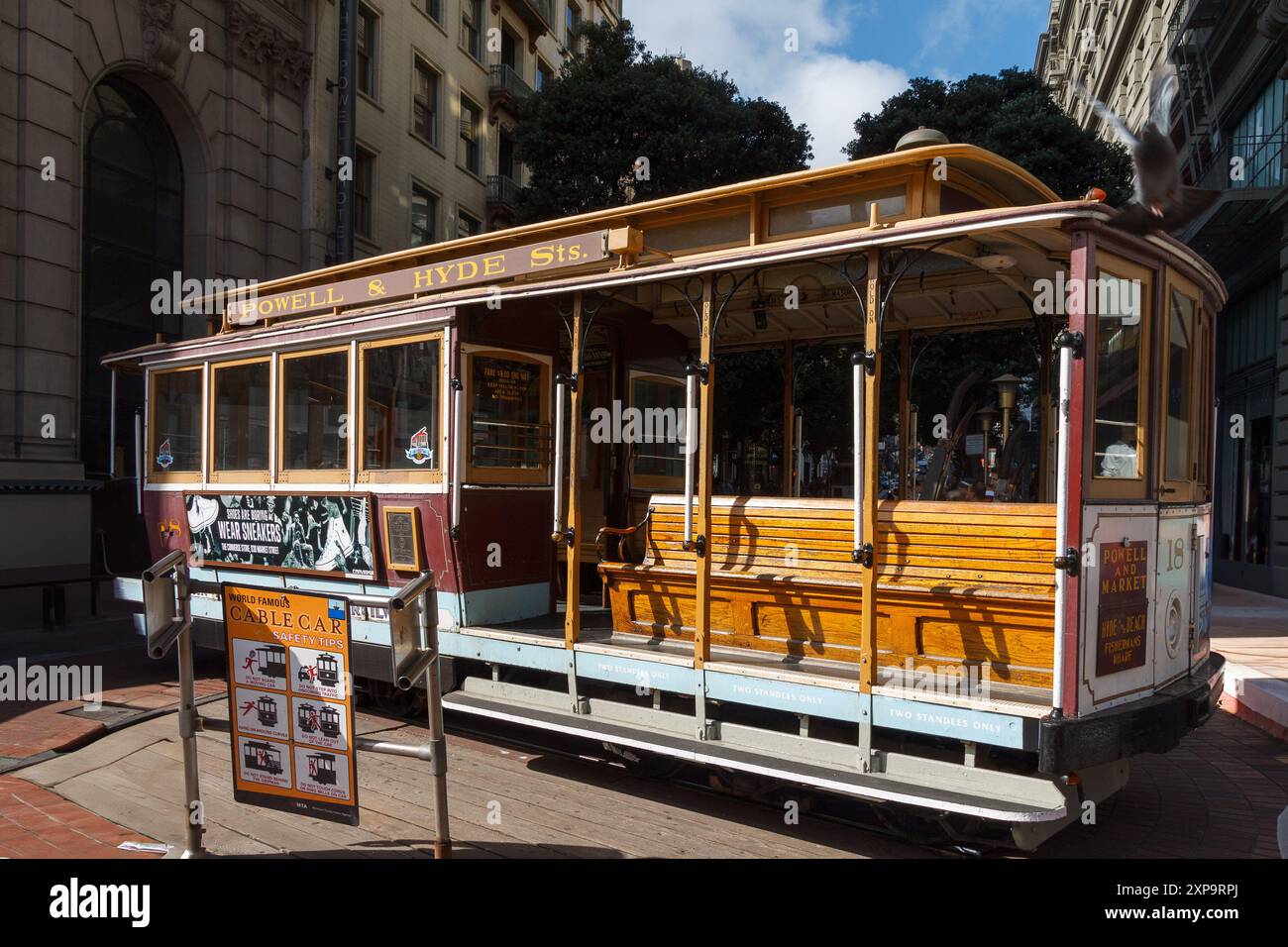 A typical old vintage wood cable car in downtown San Francisco ...