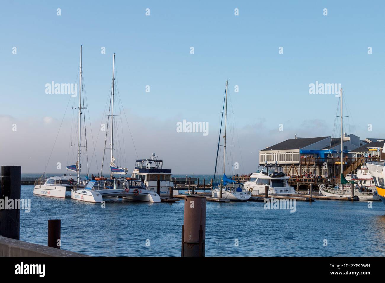 Sailboats in a marina and aHistorical building in the Waterfront of San ...