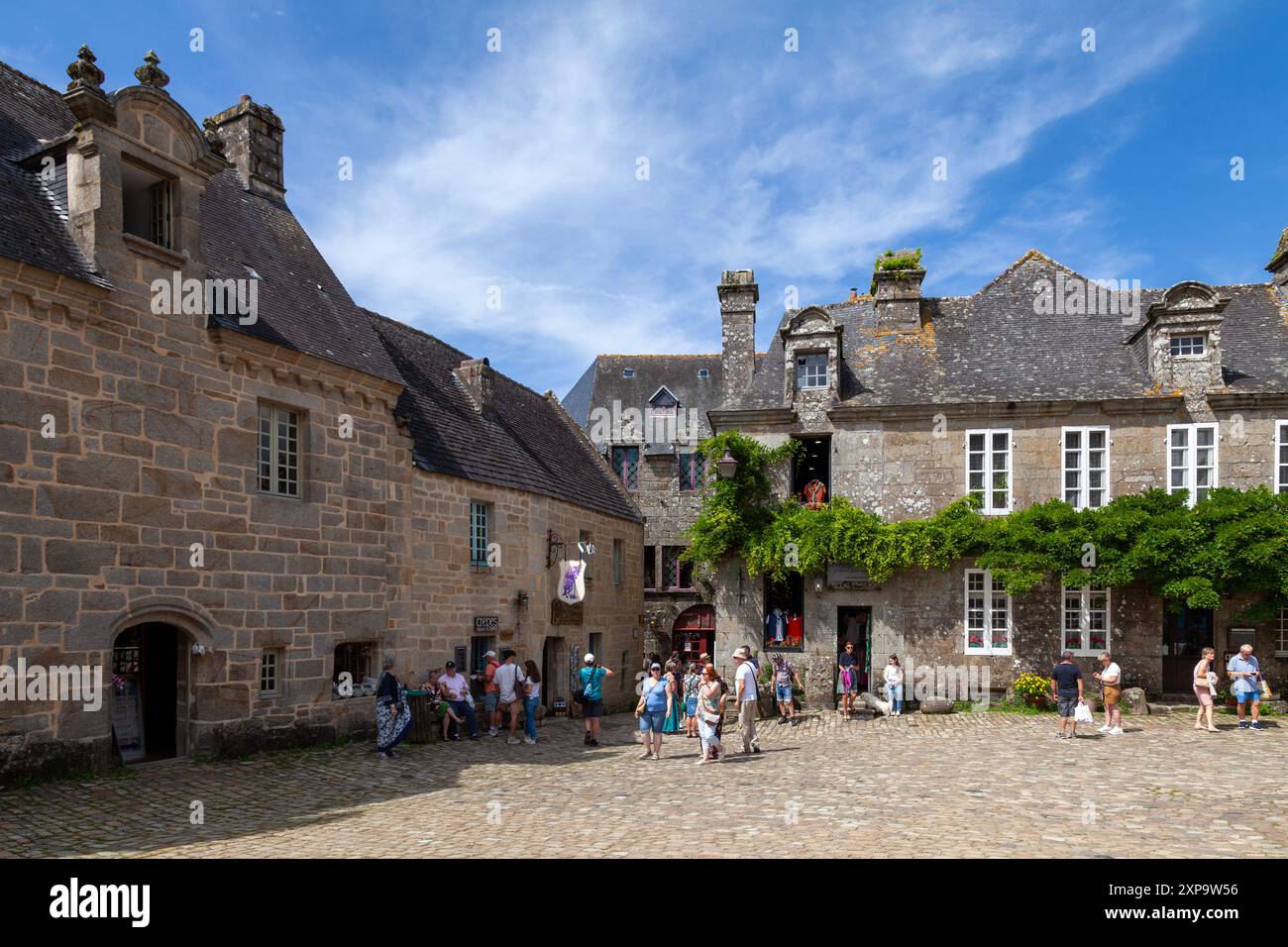 Locronan, France - August 17 2023: Old houses on Church Square (Place ...