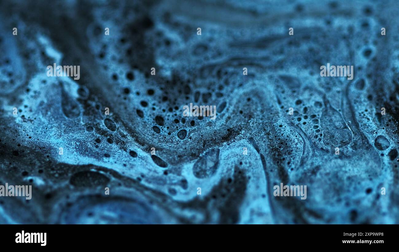 Shiny gel flow. Shimmering fluid spill. Defocused sparkling blue liquid ...