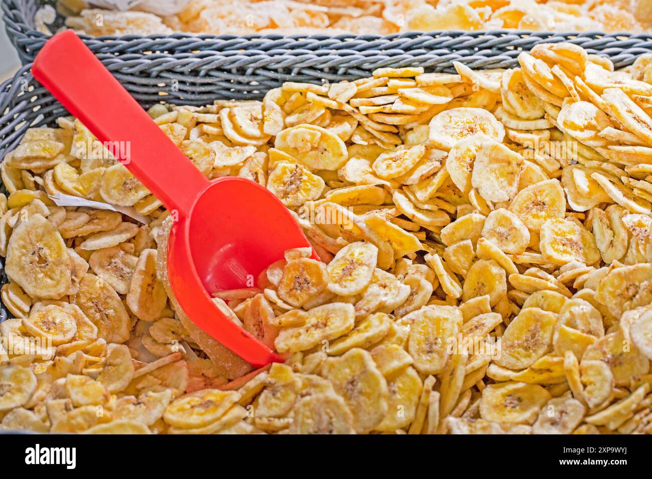 pieces of sweet dried banana in bulk in the supermarket Stock Photo - Alamy