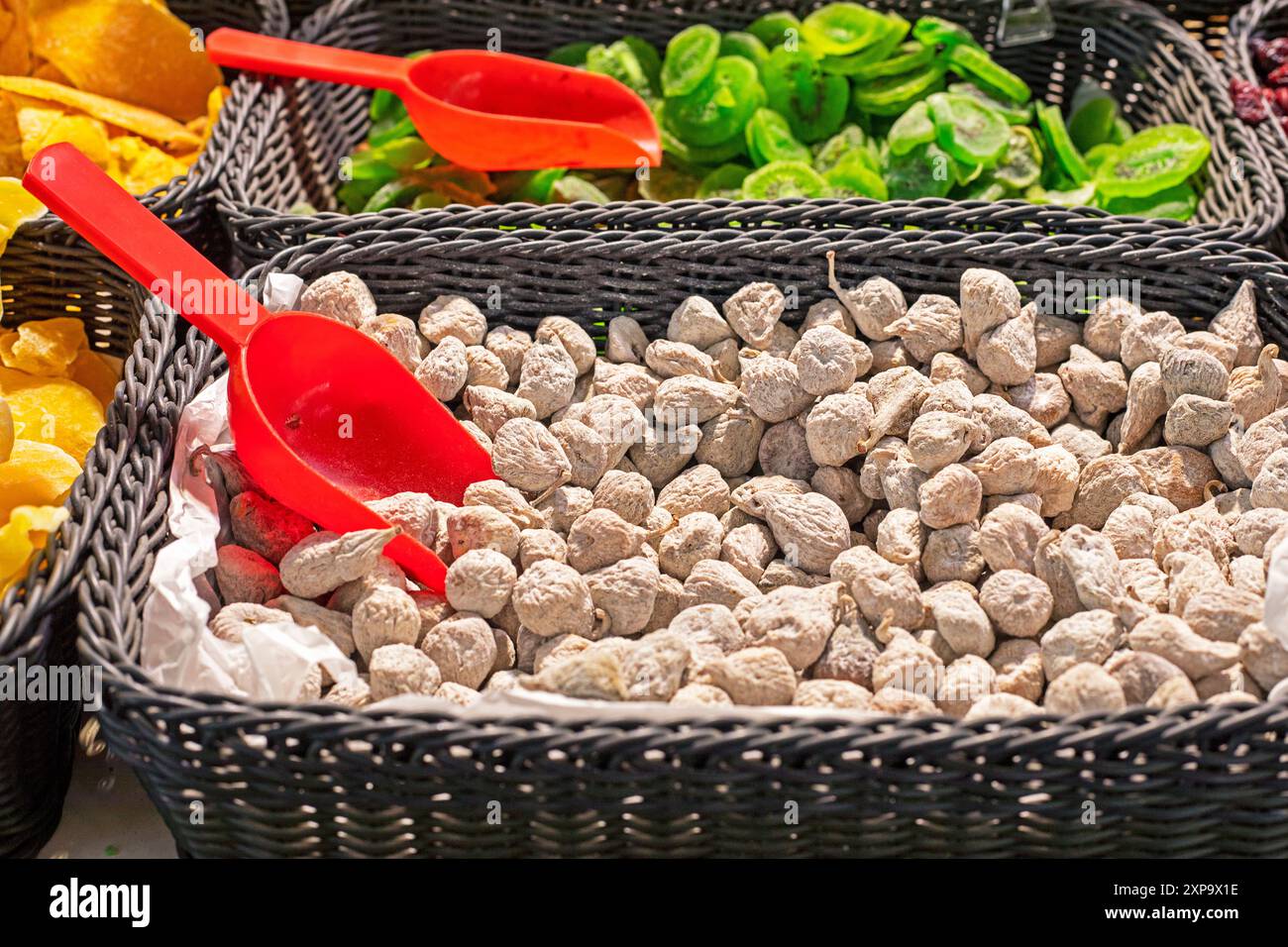 dried white figs in bulk in a container in a supermarket Stock Photo ...
