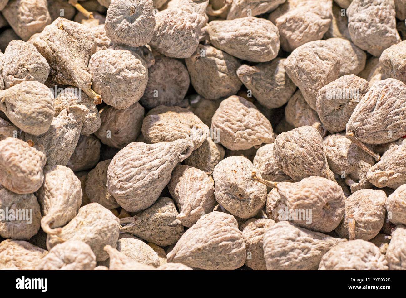 dried white figs in bulk in a container in a supermarket Stock Photo ...