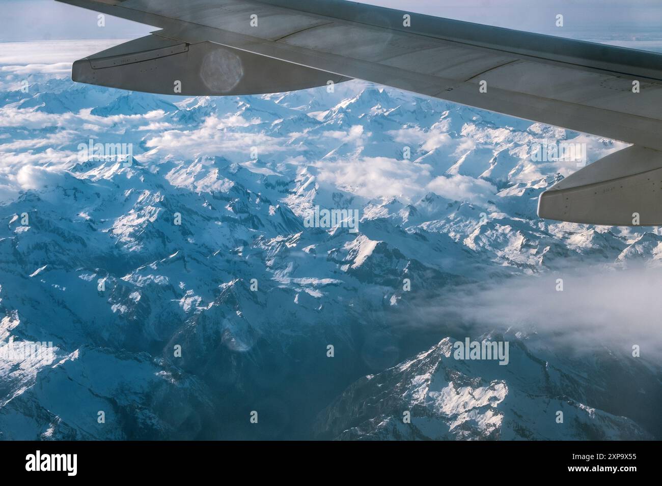 Aerial view of snow in the Swiss Alps from a passenger flight Stock ...