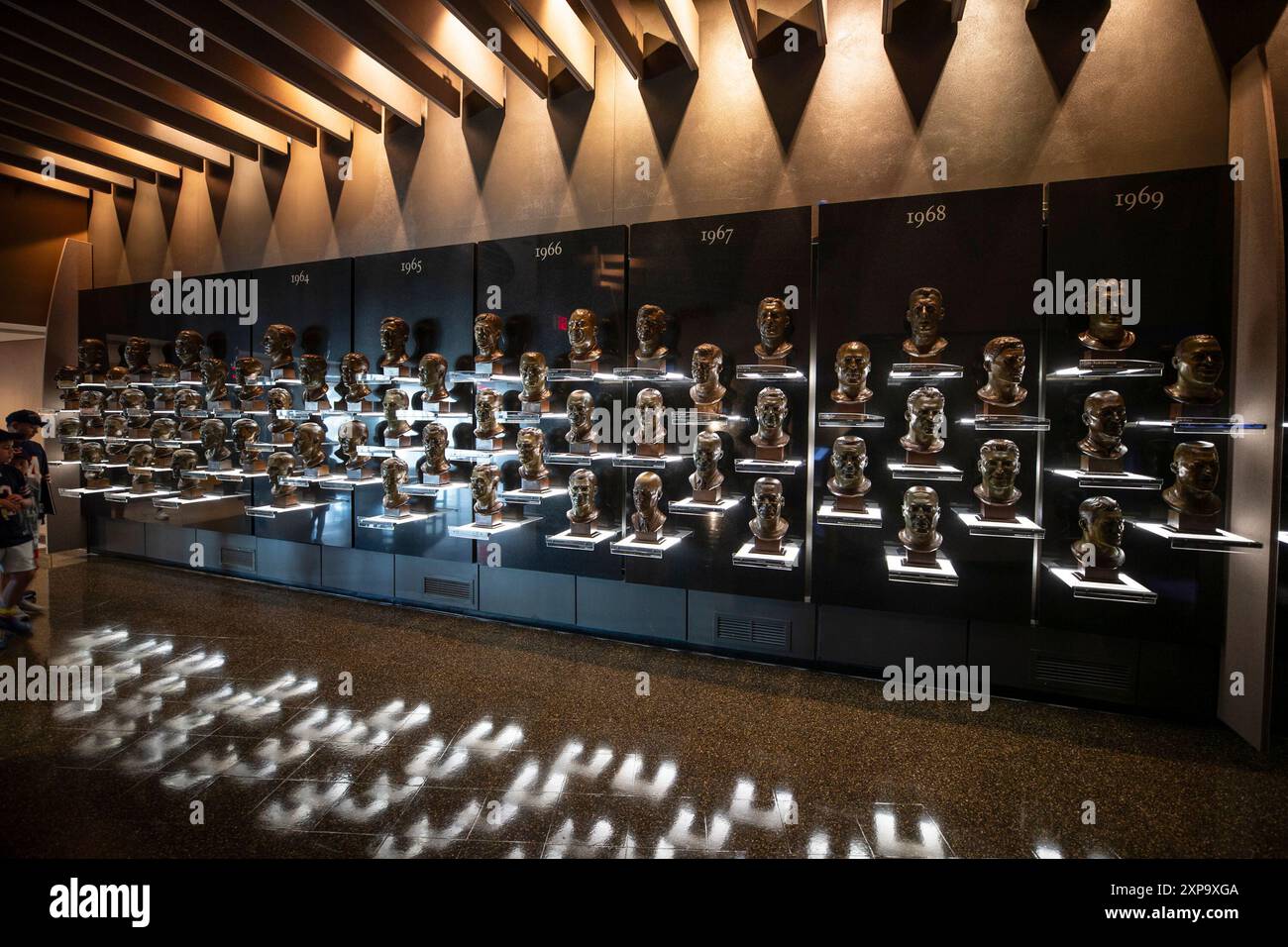 August 01, 2024: Fans look at the busts at the NFL Hall of Fame museum ...