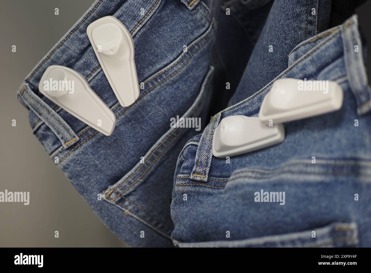 Security tags on clothes hi-res stock photography and images - Alamy