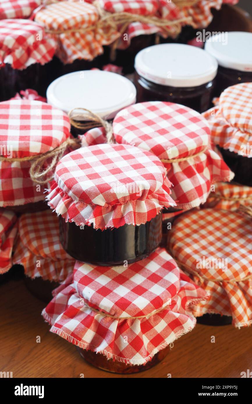 Jars of Homemade Preserves with Gingham Covers are a charming addition ...