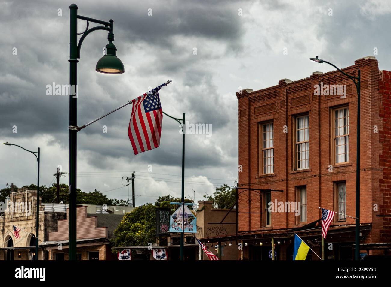 Small town USA a brown stone two story building on Main Street, Buda ...
