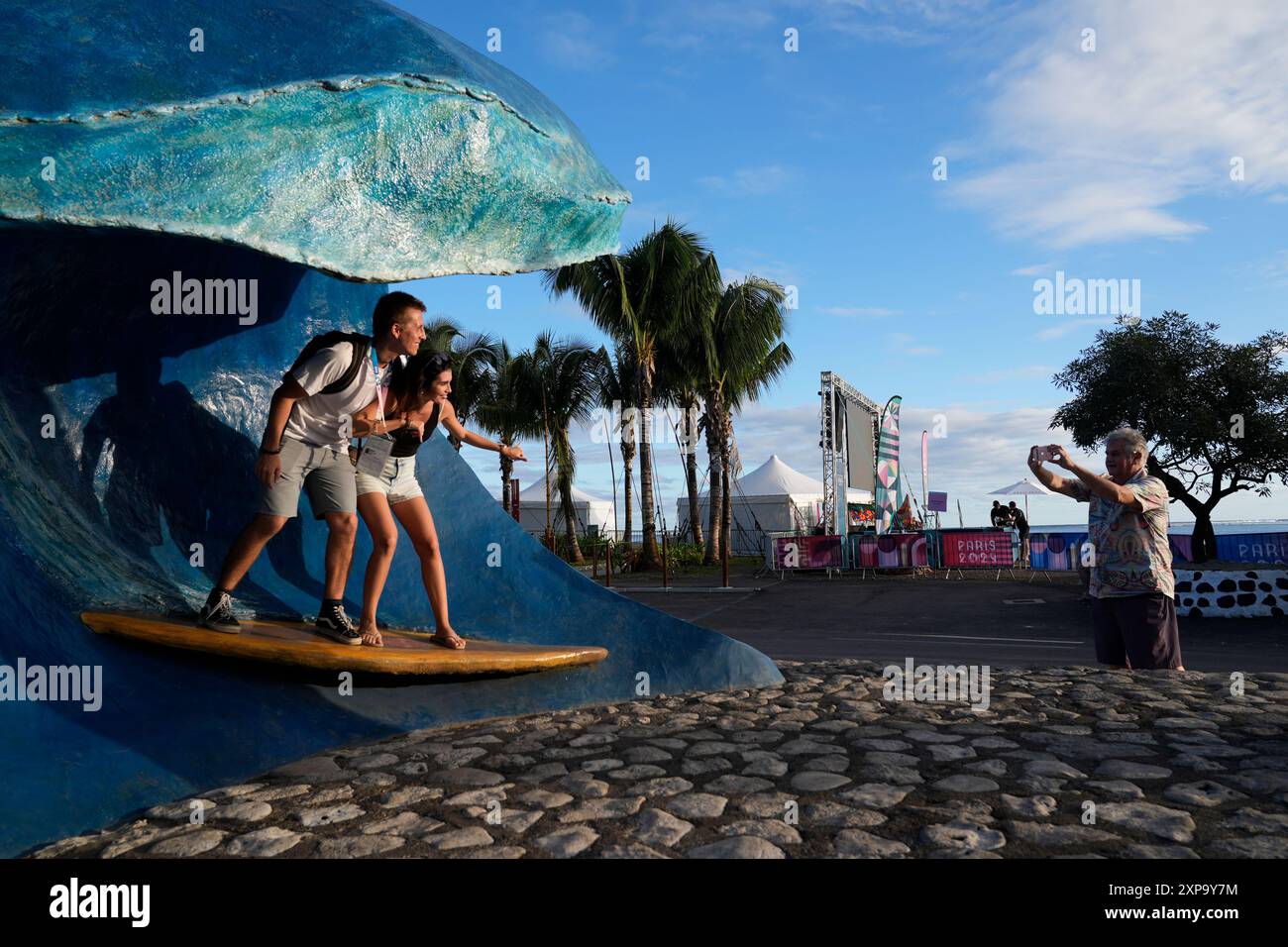 Elliot Fouchard, left, poses alongside Lea Pouliquen on a concrete wave ...