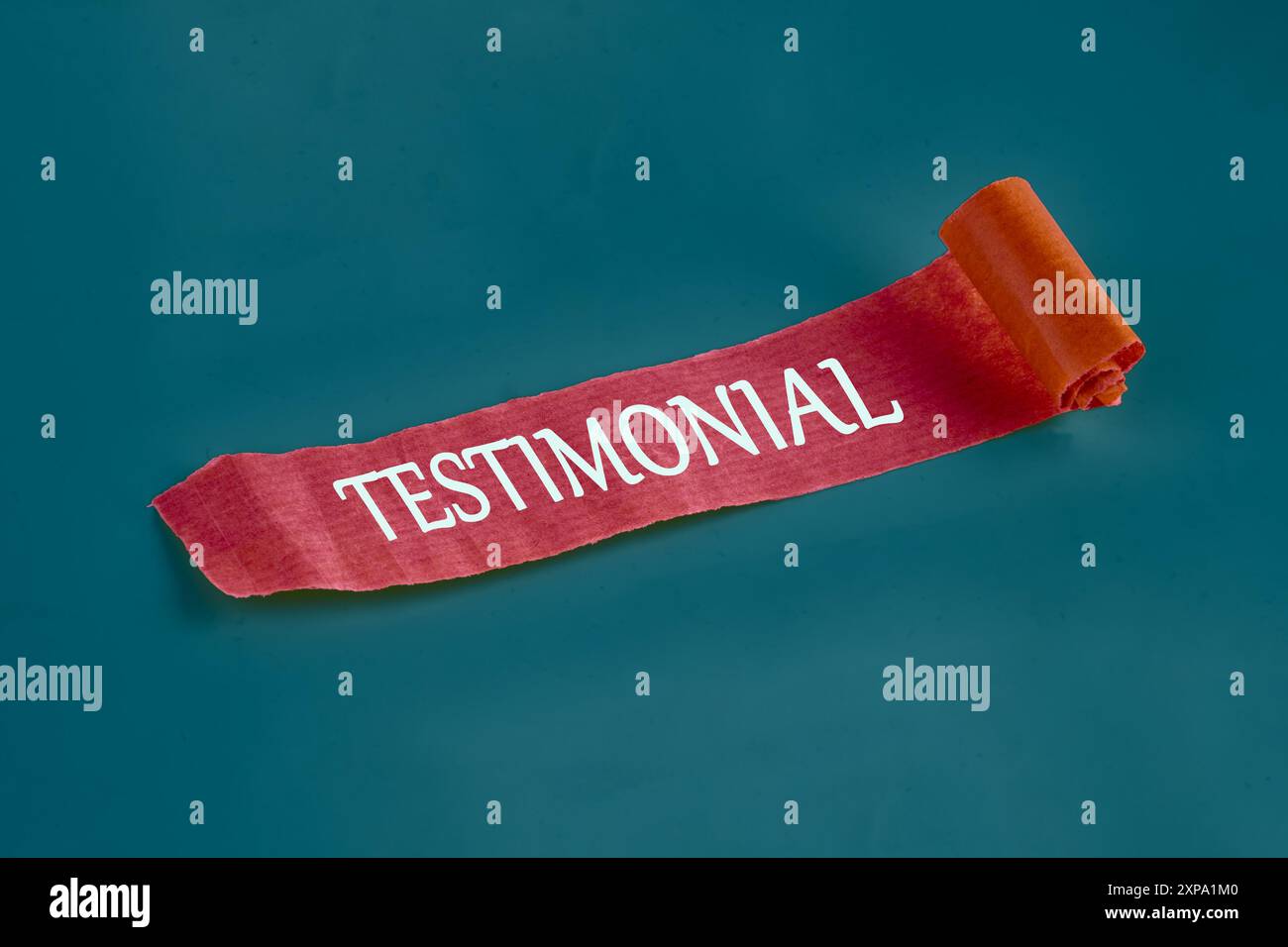 TESTIMONIAL word on a piece of an unfolded note Stock Photo - Alamy