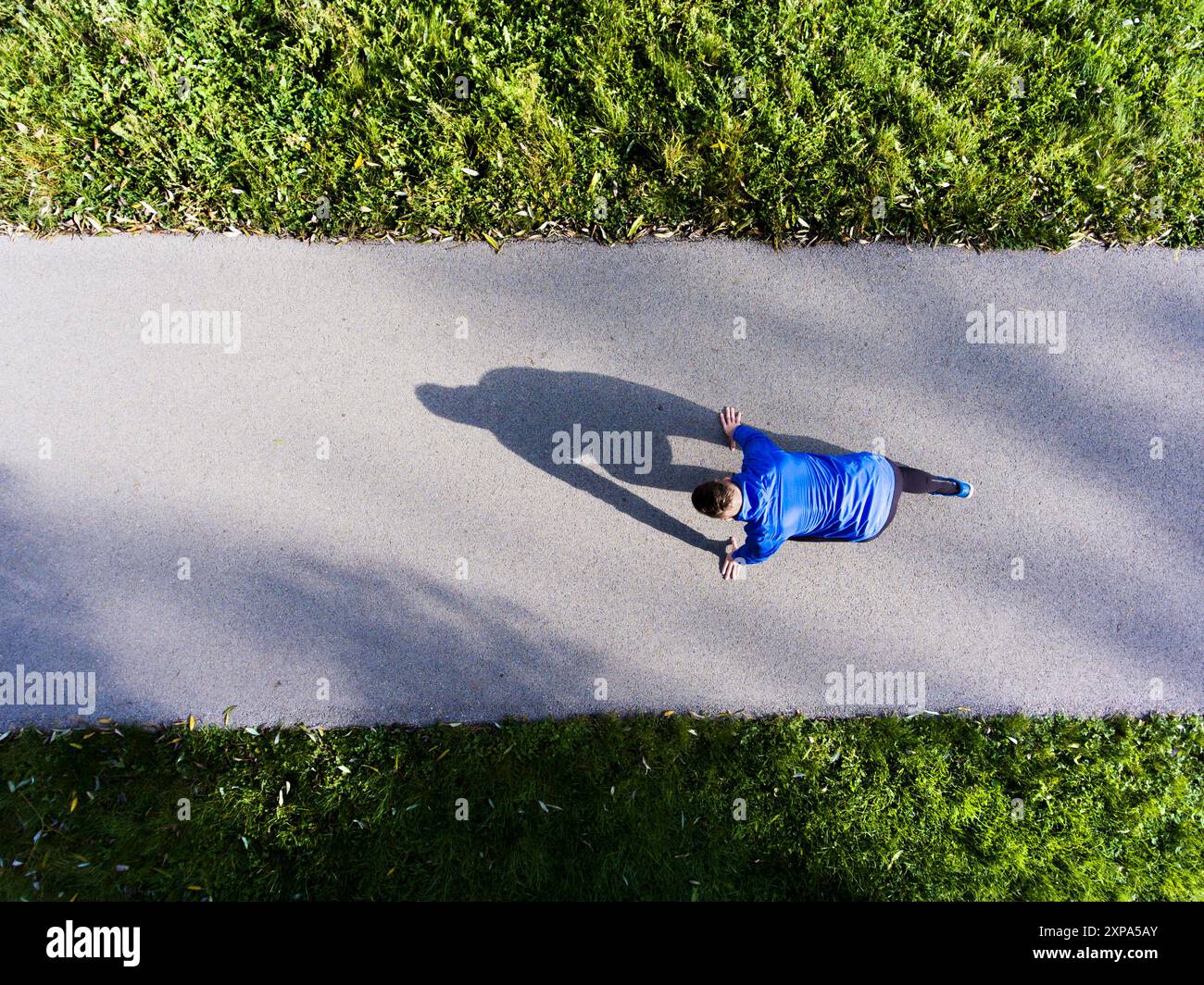 Aerial top view man jogging hi-res stock photography and images - Alamy