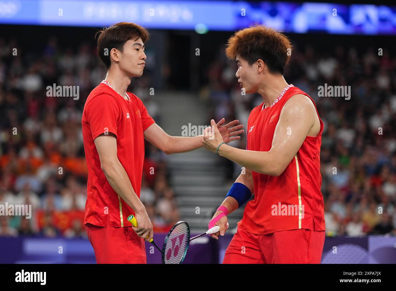 **CHINESE MAINLAND, HONG KONG, MACAU AND TAIWAN OUT** Chinese badminton players Liang Weikeng ...