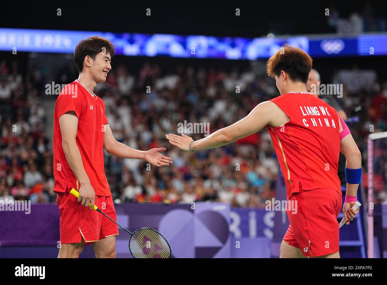 **CHINESE MAINLAND, HONG KONG, MACAU AND TAIWAN OUT** Chinese badminton players Liang Weikeng ...