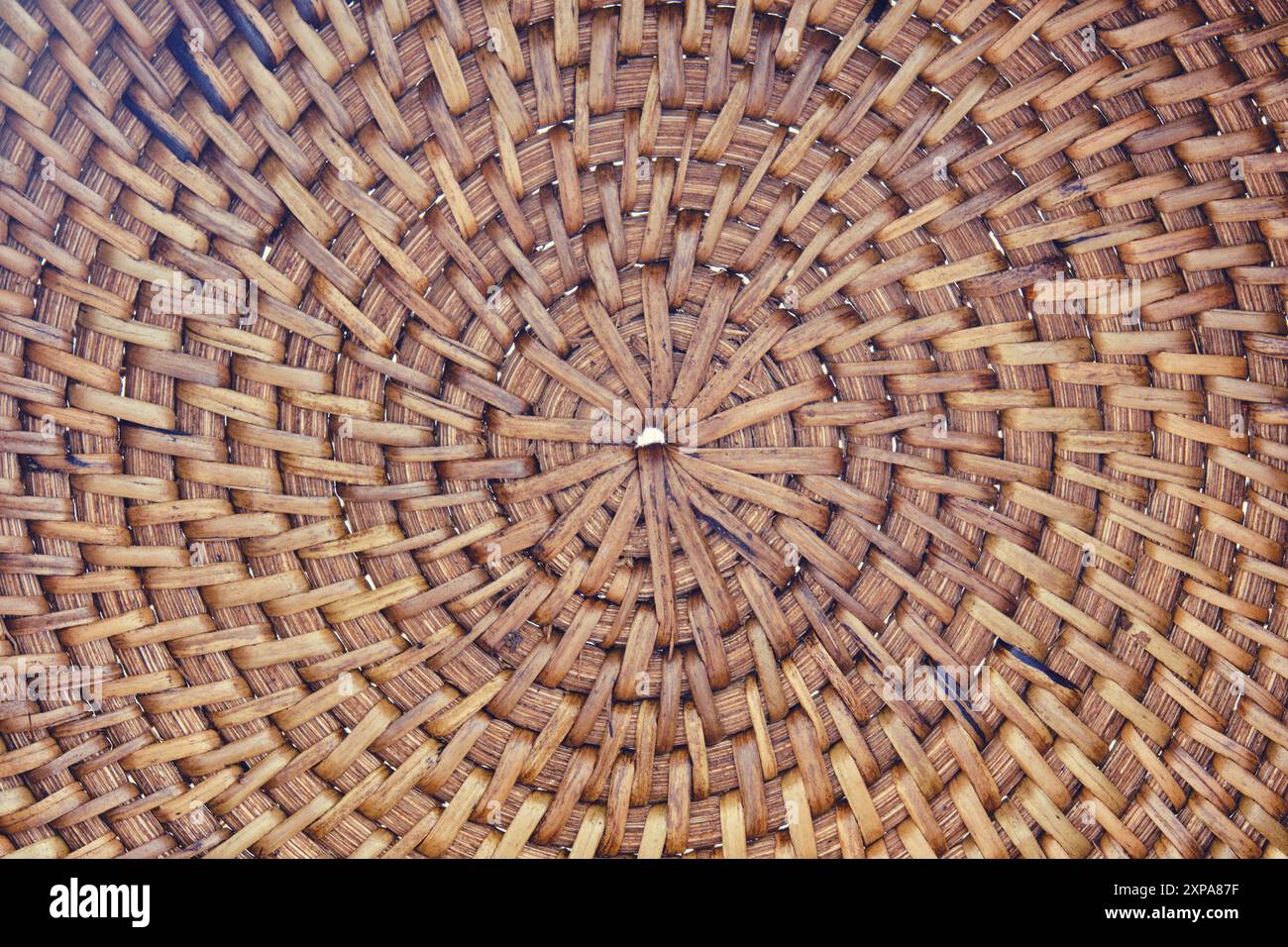 Close-up of circular wicker basket pattern. Natural texture and craft ...
