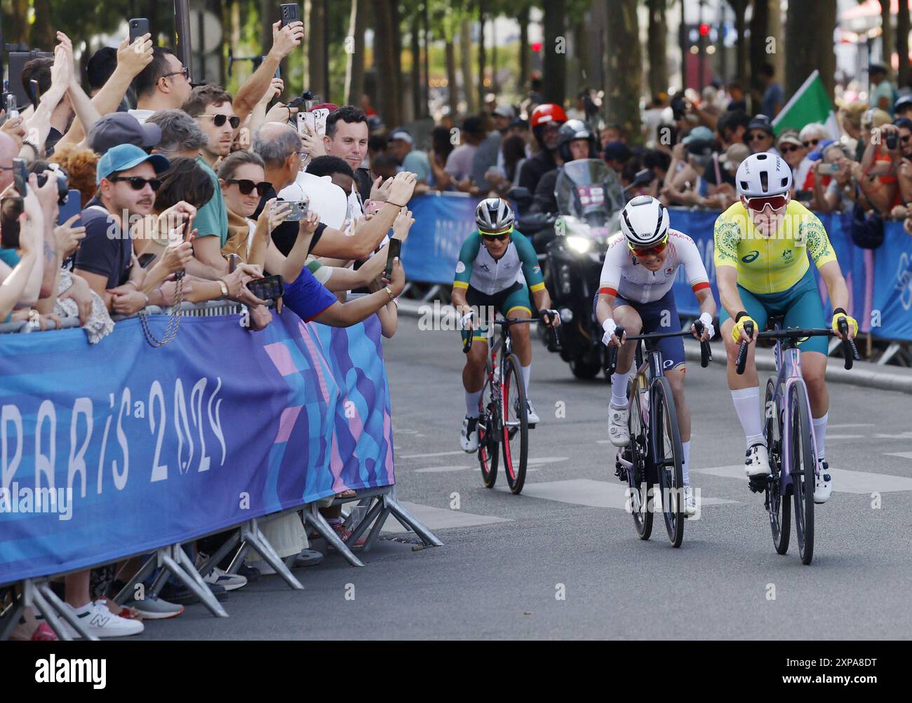 Riders, including Eri Yonamine (2nd from R) of Japan, compete in the ...