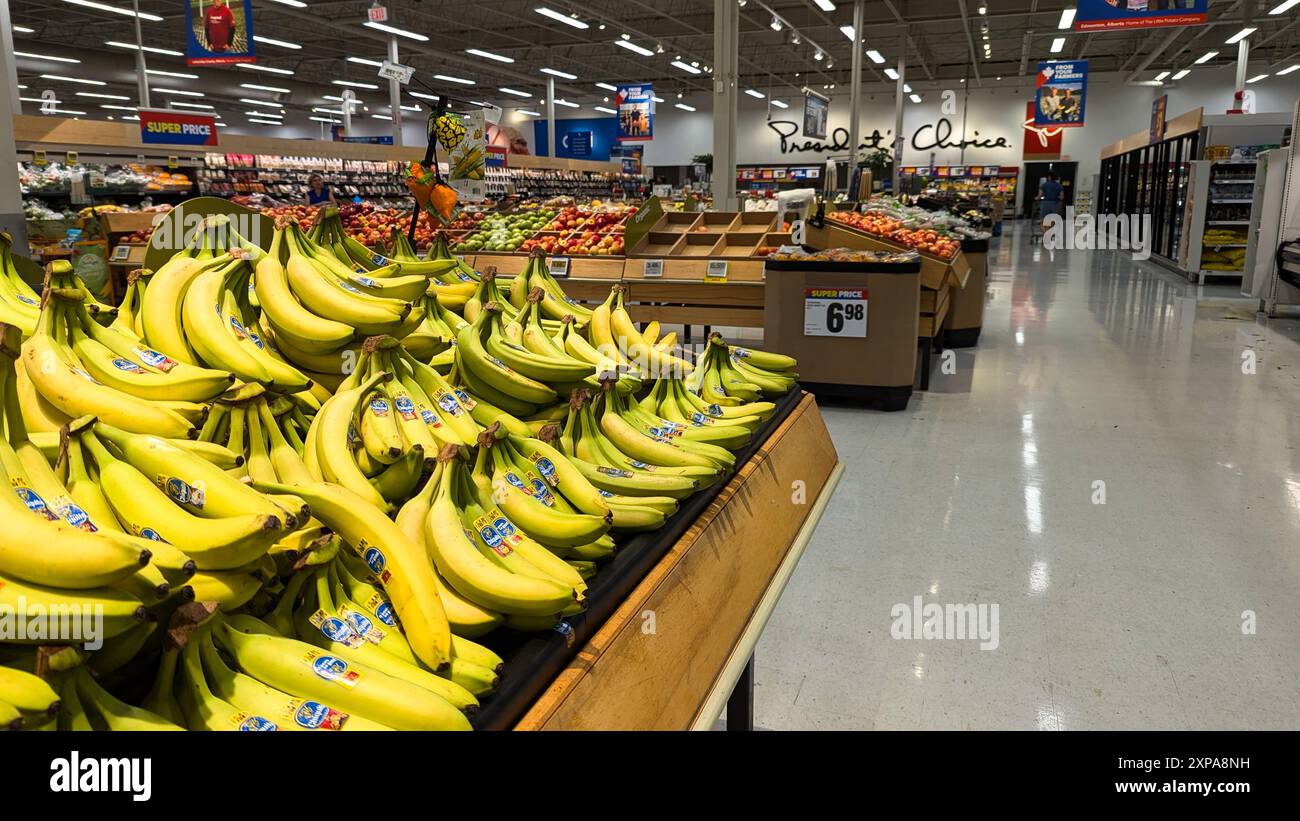 Fresh vegetables and fruits on the counter in a superstore Stock Photo ...