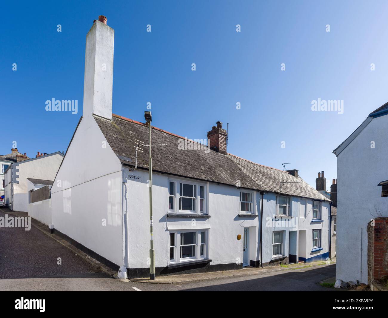 Terraced cottages lining the narrow streets in the coastal village of ...