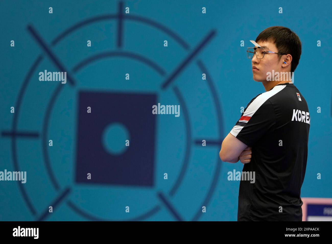 South Korea's Cho Yeong-jae gestures as he competes in the 25m rapid ...