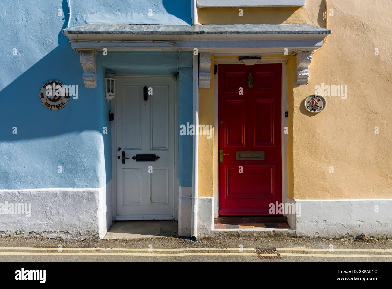 Front doors of two terraced houses in the coastal village of Appledore ...