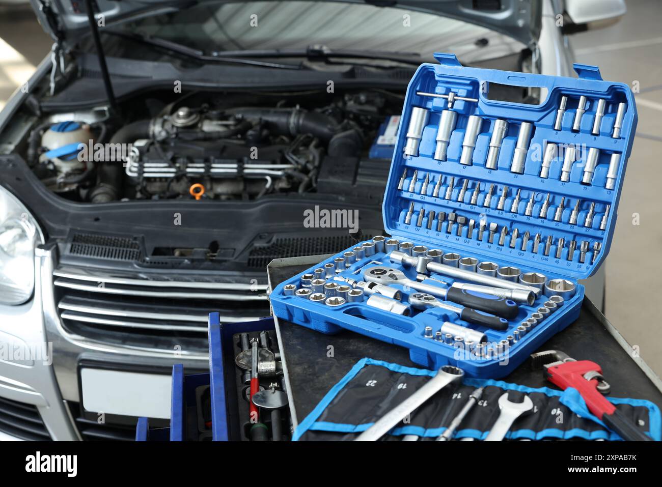 Set of different auto mechanic's tools indoors Stock Photo - Alamy