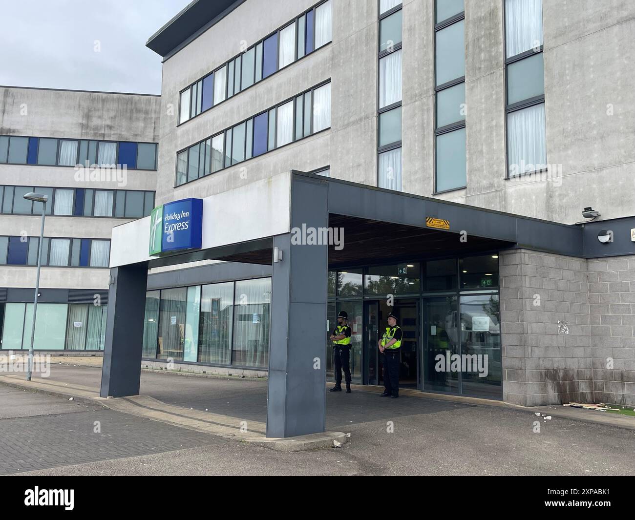 Police officers outside the Holiday Inn Express in Rotherham, South ...