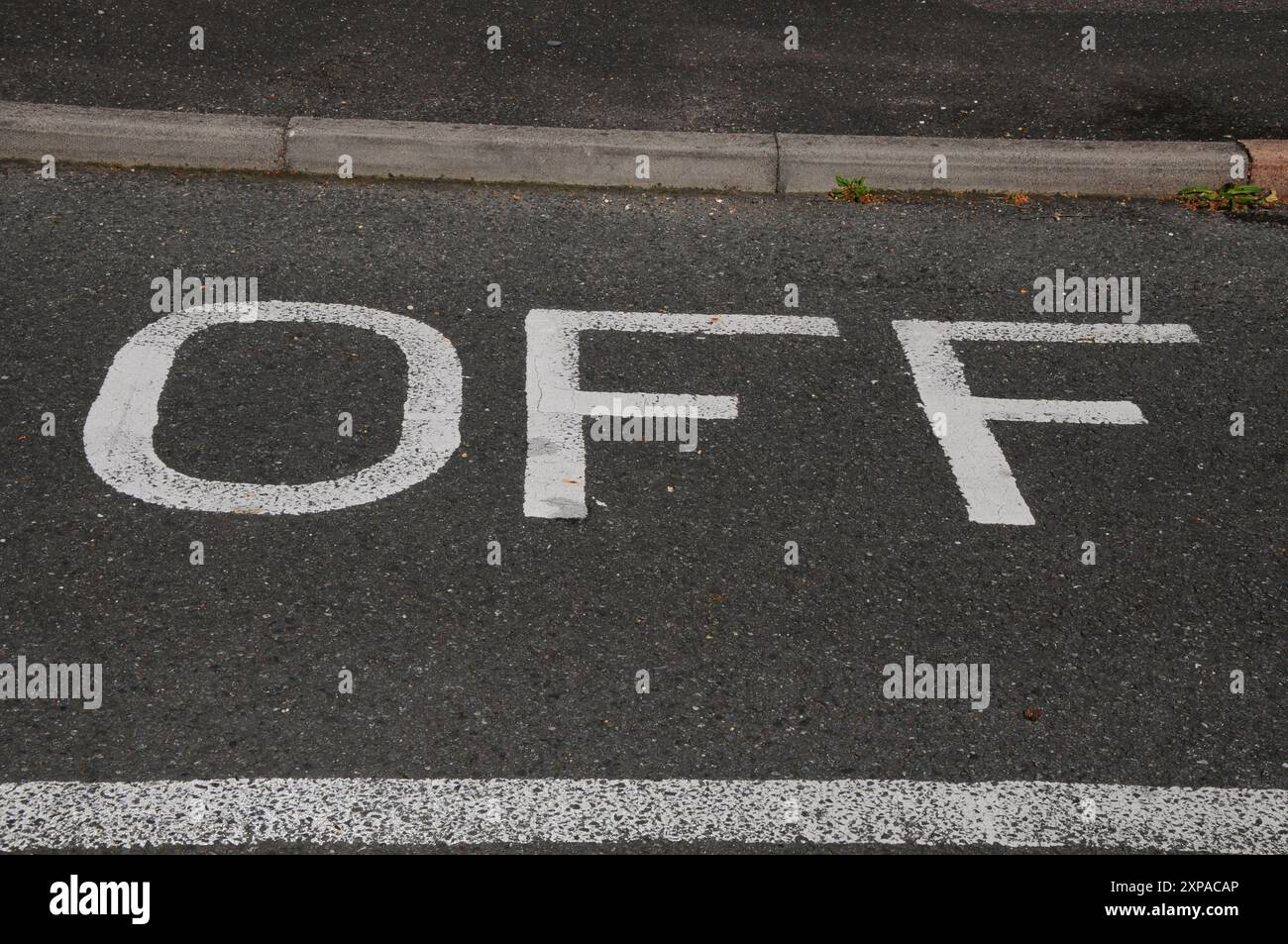 Off sign on tarmac Stock Photo - Alamy
