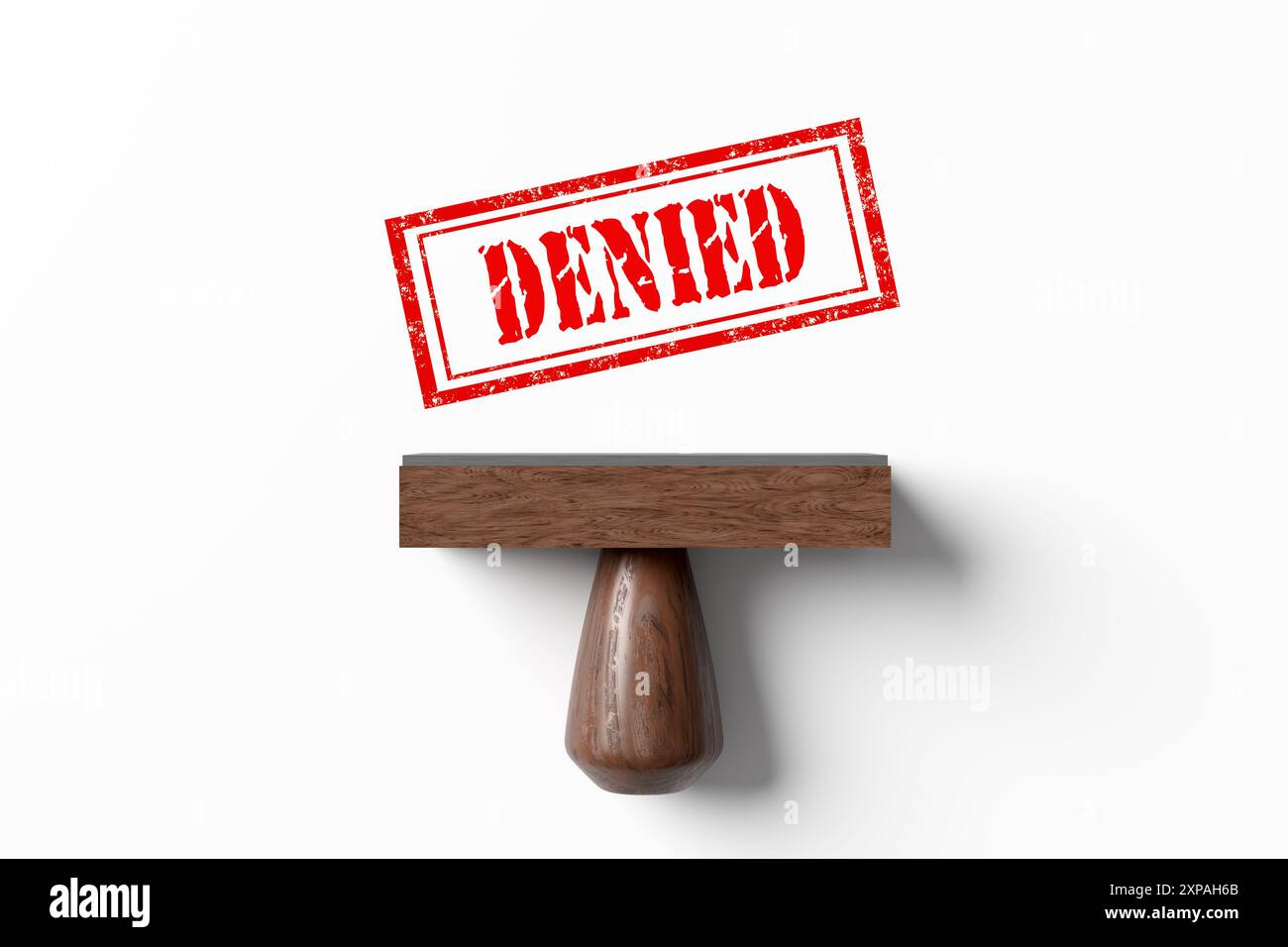 Rubber stamp imprints the word denied on white paper. Rejection in ...