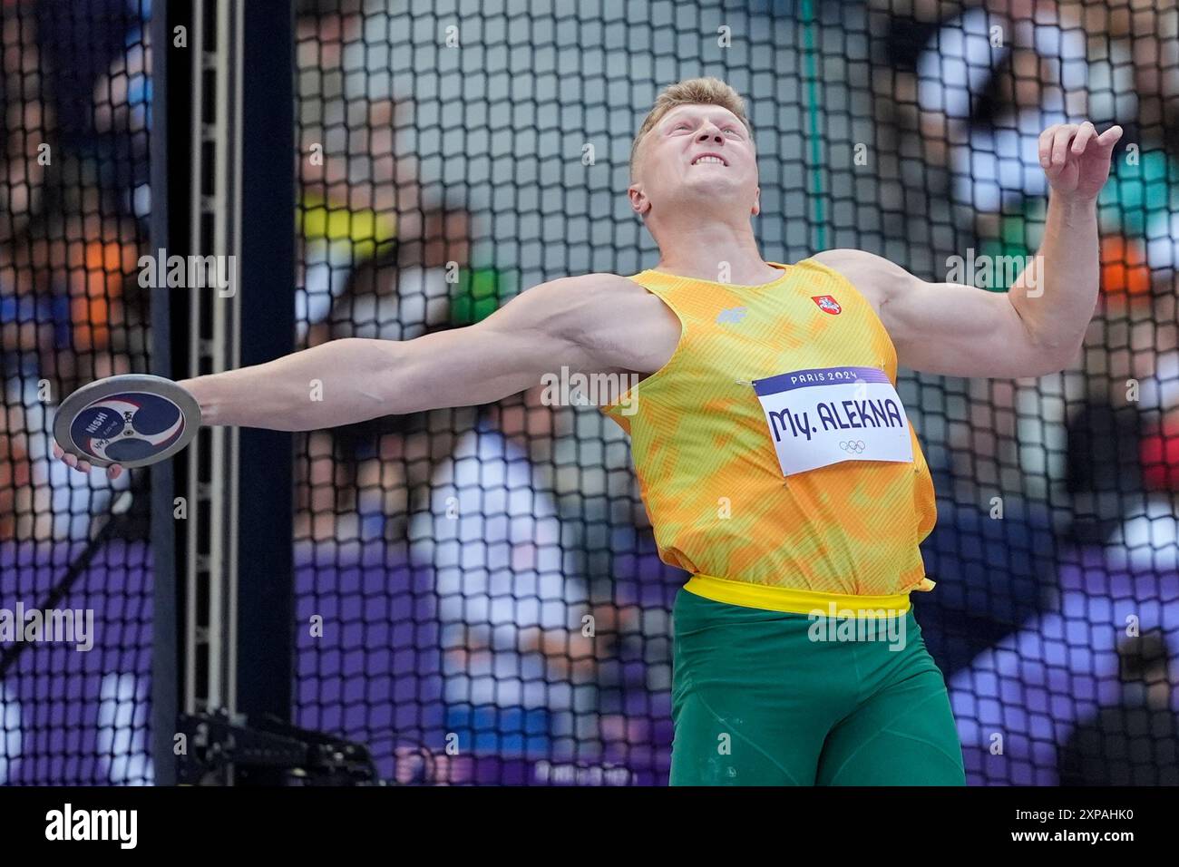 Mykolas Alekna, of Lithuania, competes during the men's discus throw ...