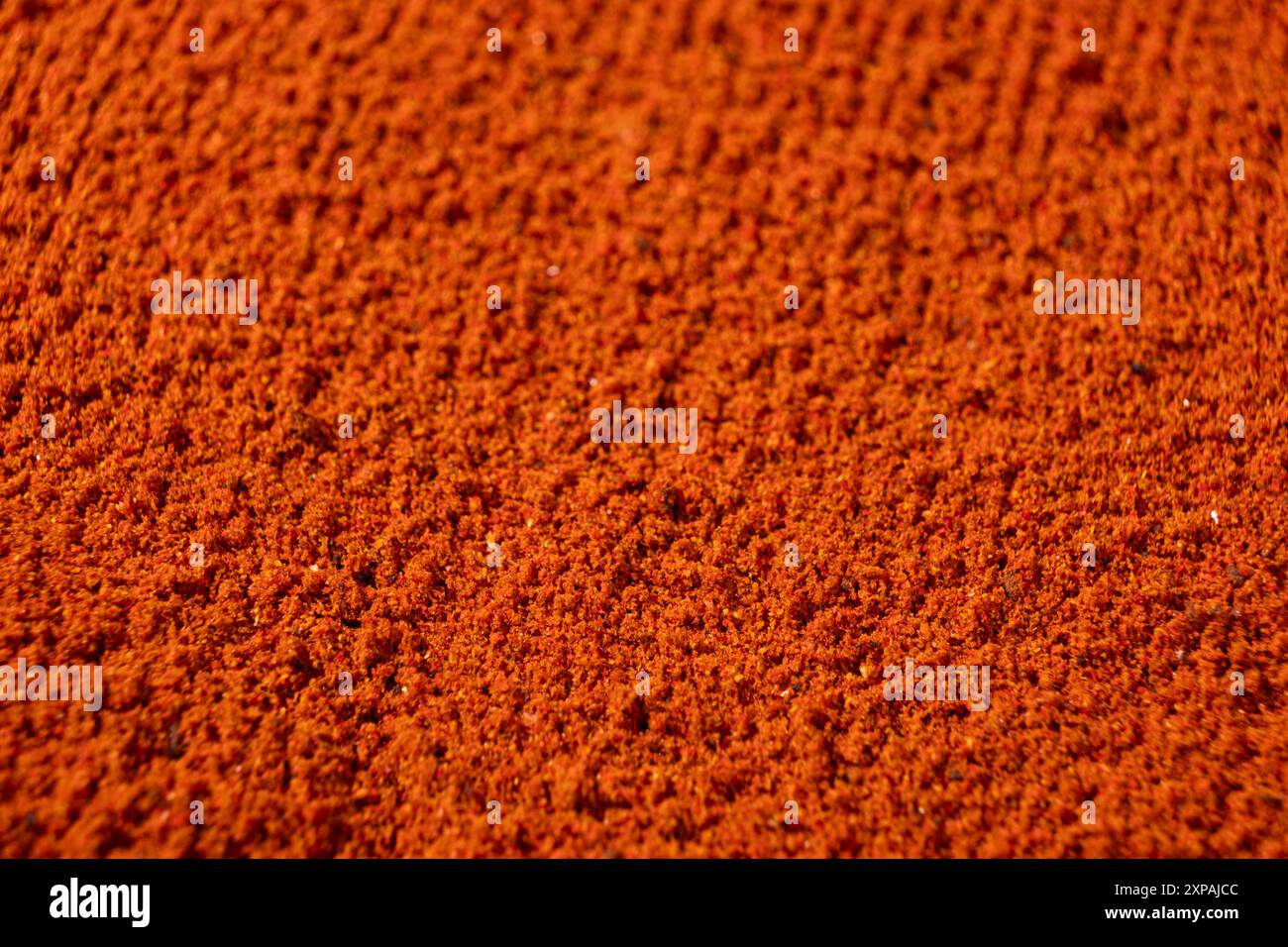 Ground paprika, red terracotta spice background, art in cooking Stock ...