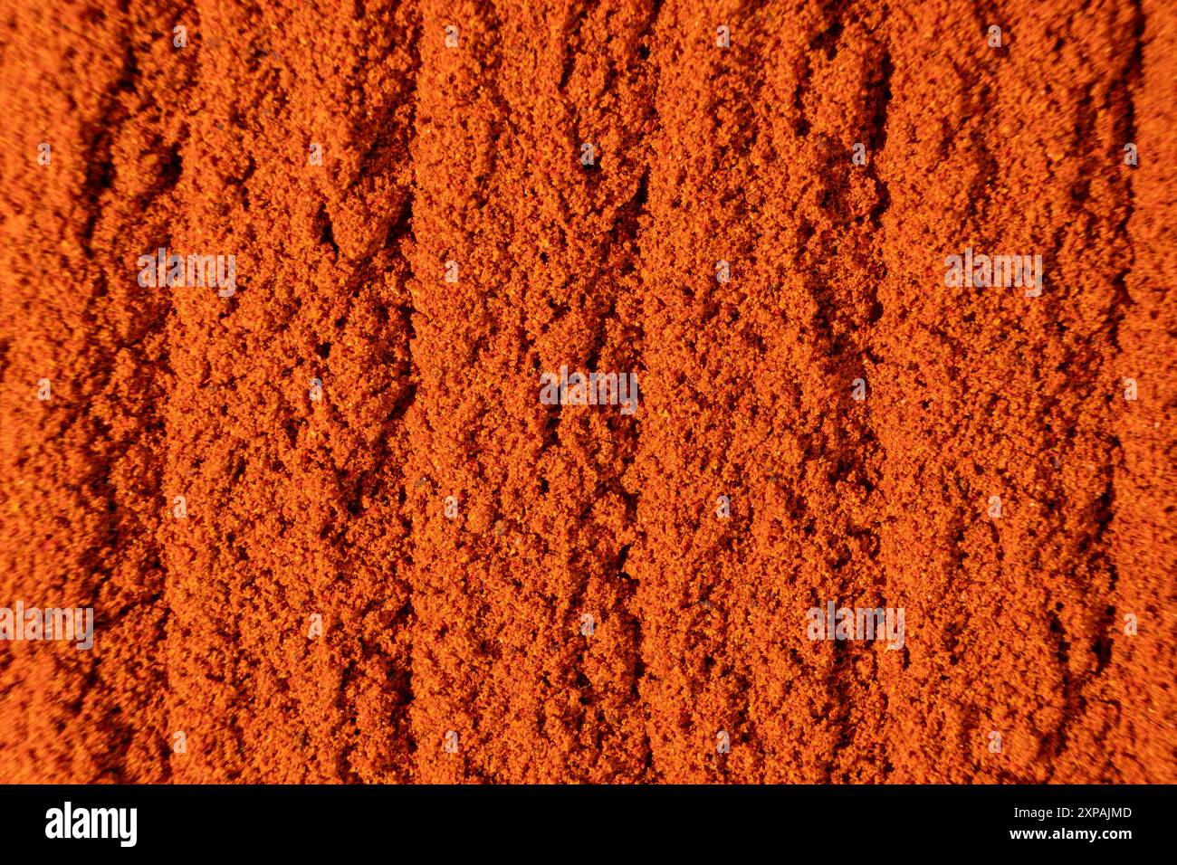 Ground paprika, red terracotta spice background, art in cooking Stock ...